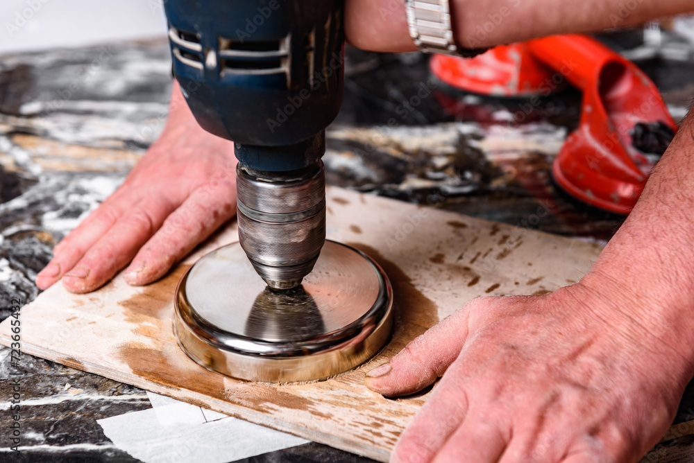 Drilling hole in ceramic tile with diamond crown using template and ...