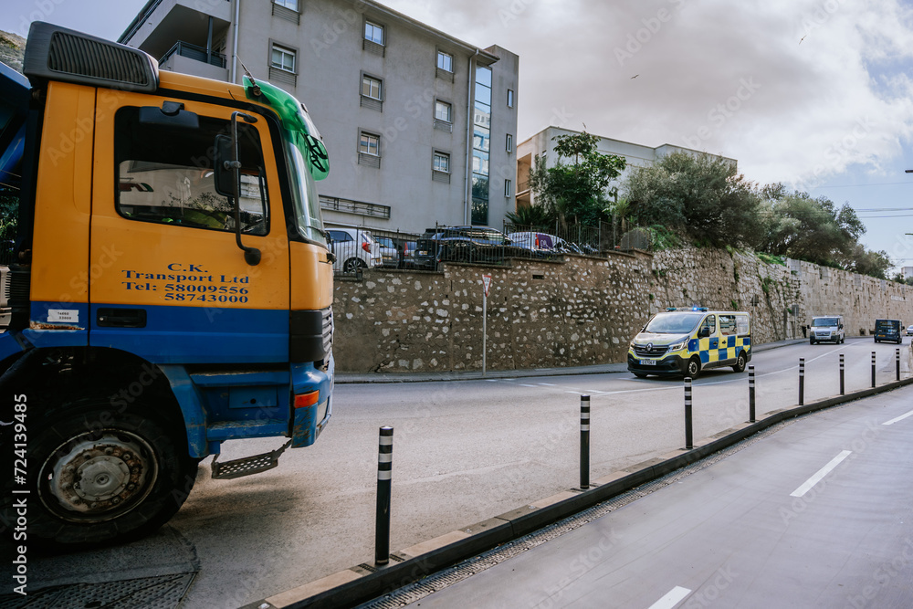 Gibraltar, Britain - January 24, 2024 - vibrant yellow and blue truck ...