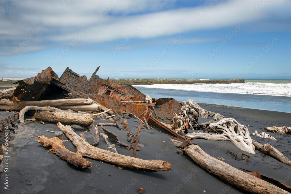 S.S. Waitangi shipwreck. Rusty shipwreck at Mana Bay New Zealand. Patea ...