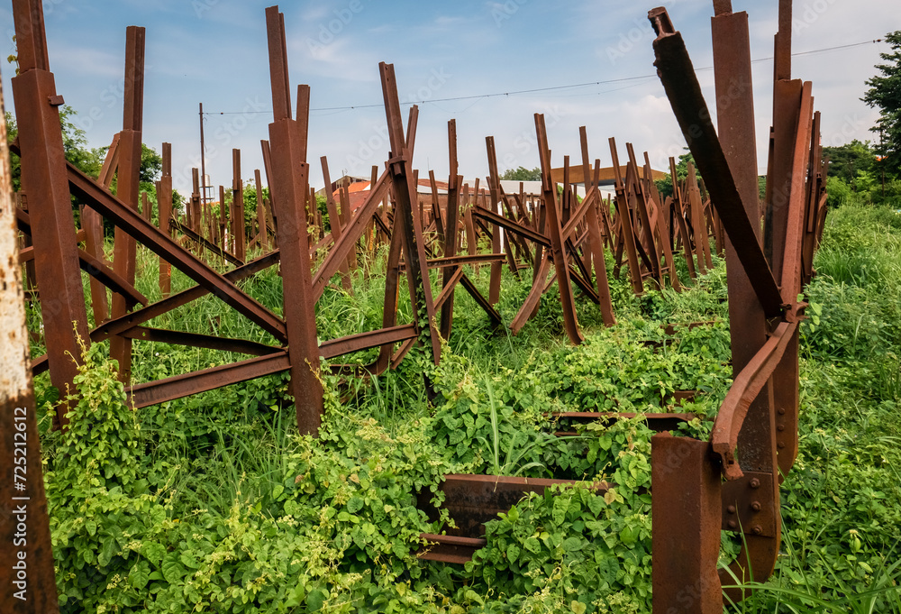 Scrap iron from used train cars carrying food in factory yards that are ...