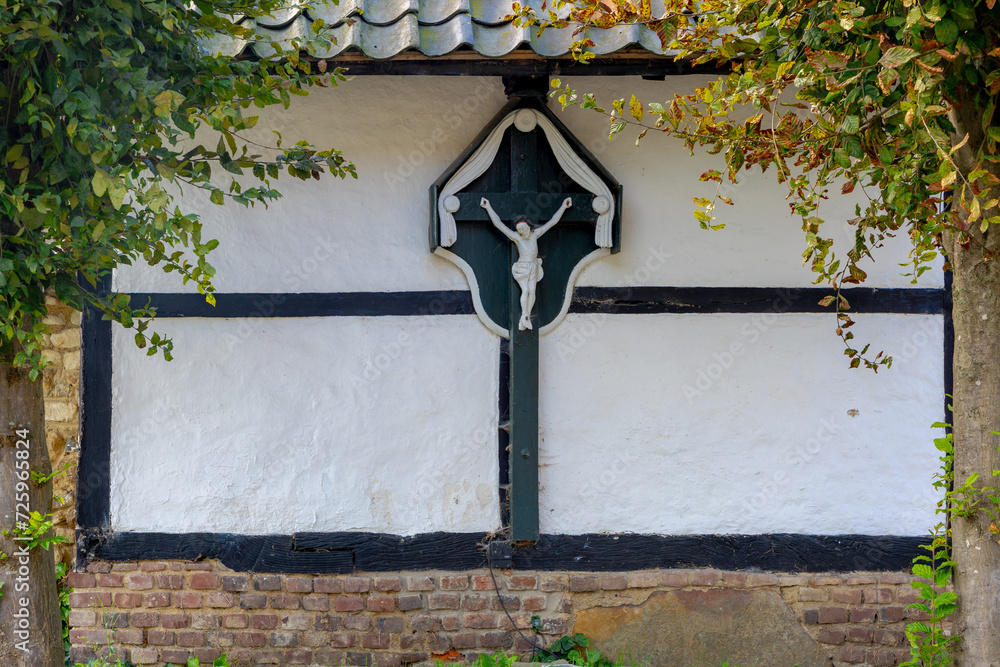 Jesus cross sign hang on Dutch timber framed houses wall (vakwerk ...
