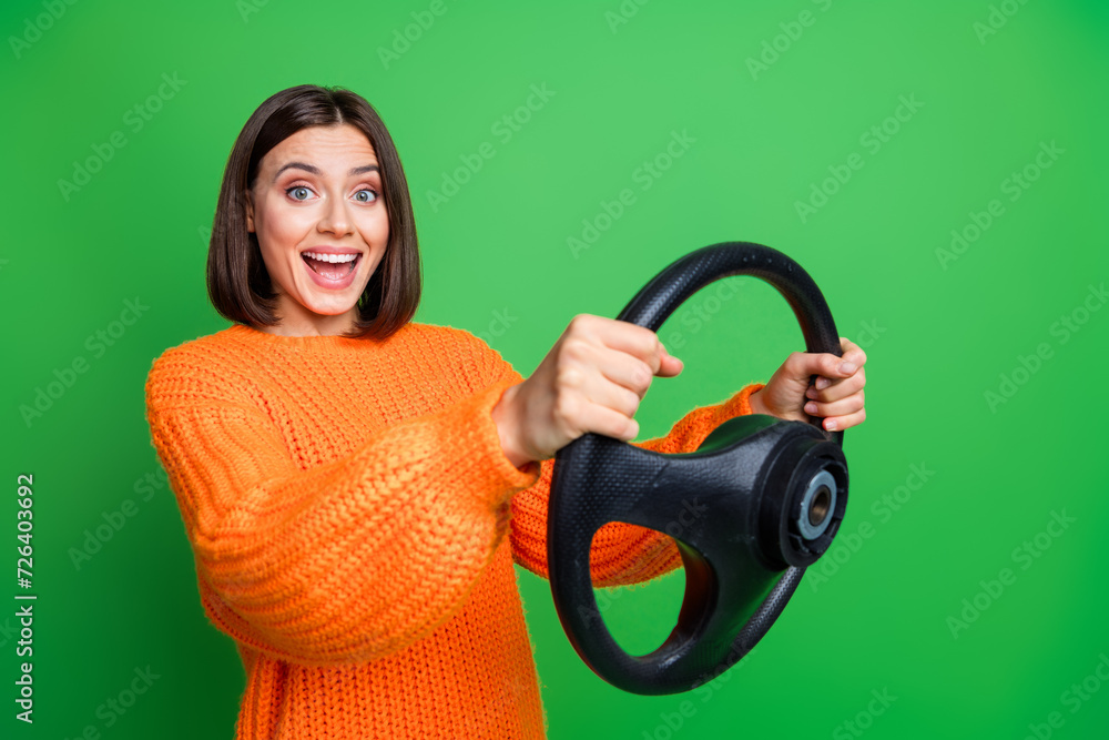 Profile photo of pretty impressed girl arms hold wheel open mouth empty ...