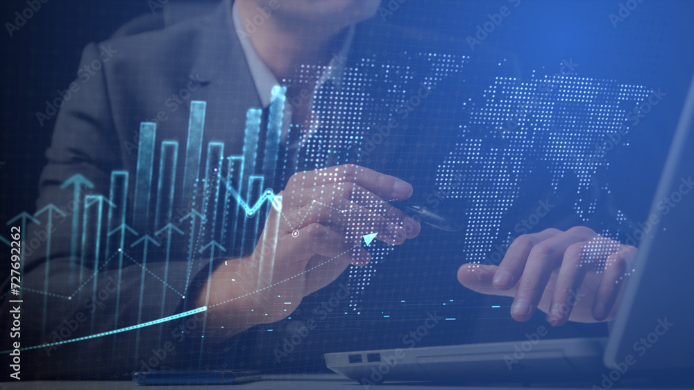 CG collage businessman working on laptop and background graphics and ...