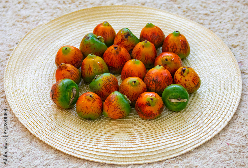 Rare and exotic fruit of the peach palm (Bactris gasipaes), typical ...