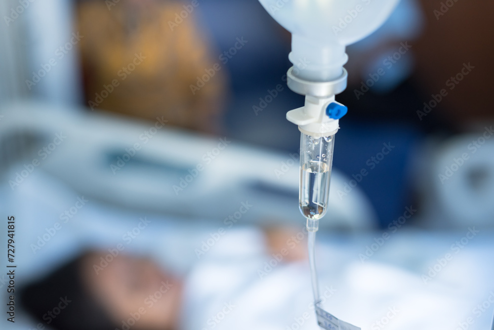 Close up set iv fluid intravenous drop saline drip in hospital room ...
