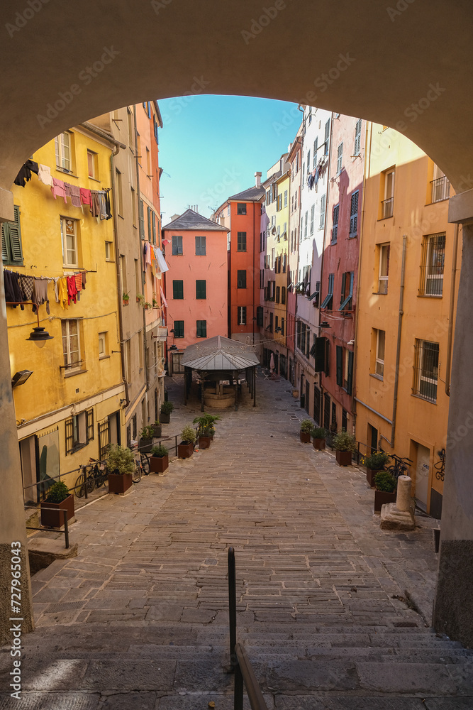 Romantic backstreet, side street or alley in historic old town of Genoa ...