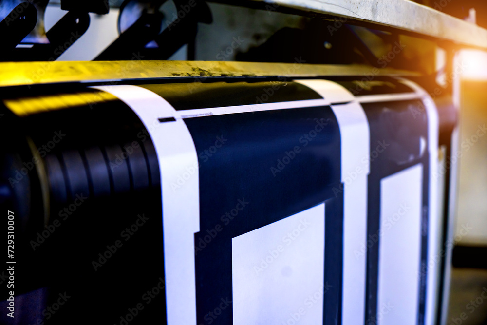A industrial commercial envelope making machine, making paper envelopes ...