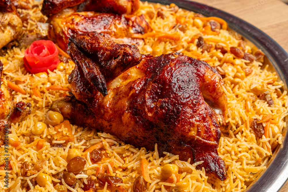 Bukhari rice mansaf with grilled chicken Stock Photo | Adobe Stock