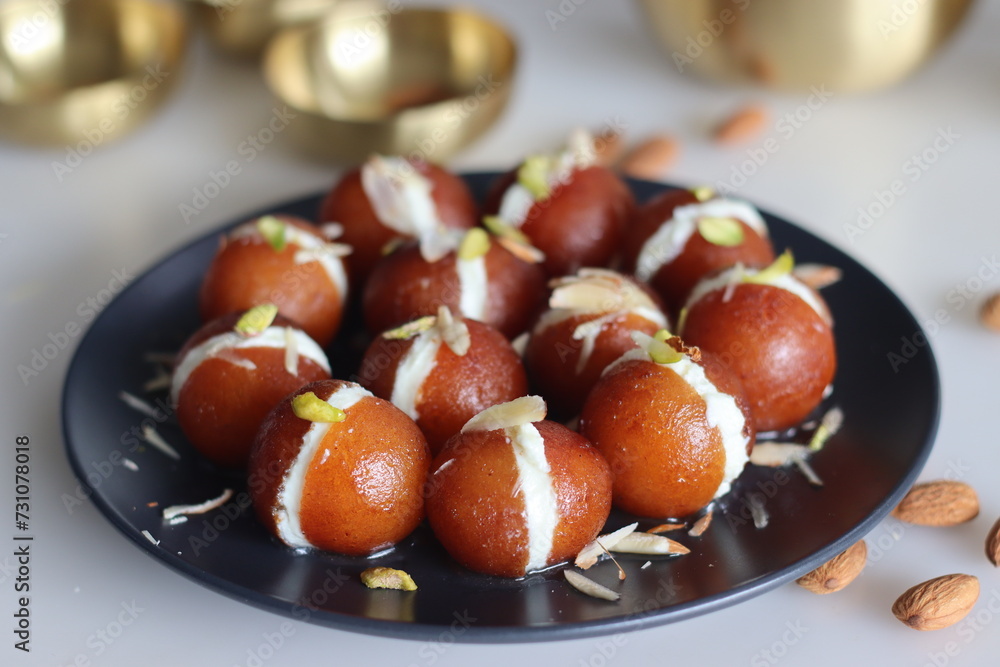 Malai Gulab Jamun. Gulab Jamun sandwich with milk cream filling. Fusion ...