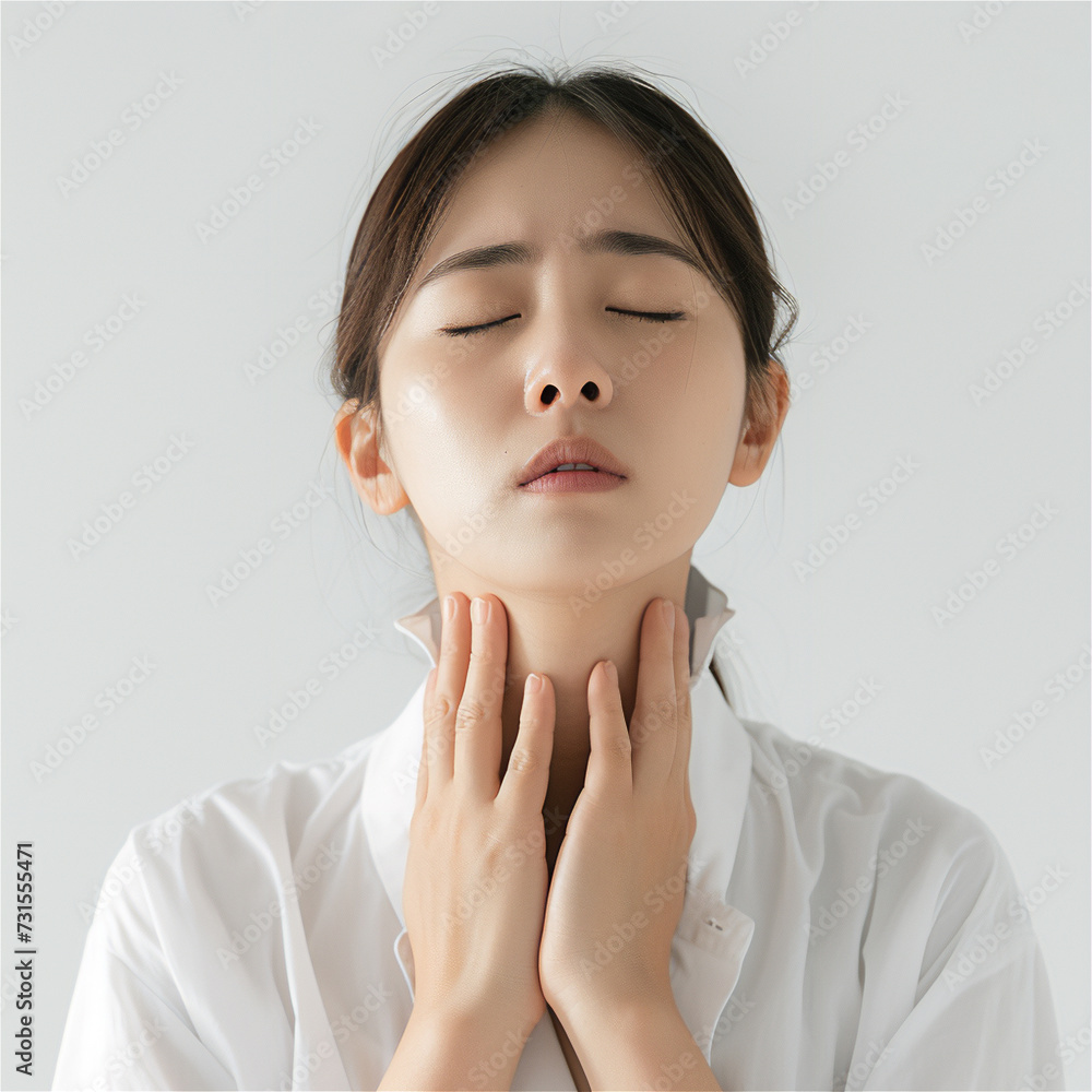 asian woman covering her neck in pain due to thyroid disease Stock ...