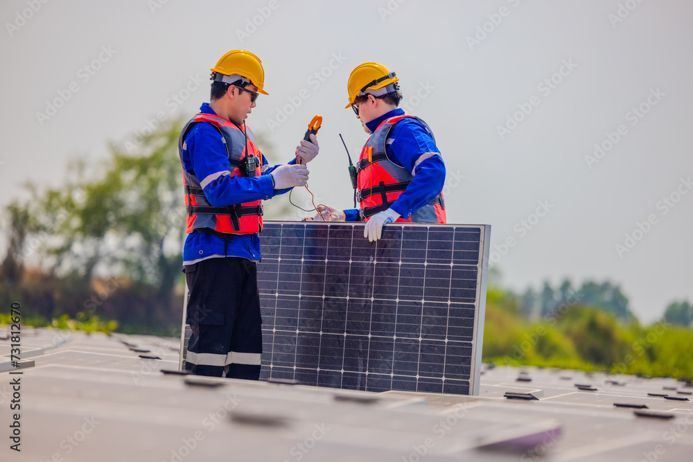 Technicians check floating solar farm wiring, polarity, and grounding ...