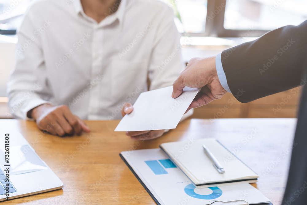 Good job Asian manager business man giving financial reward in an ...