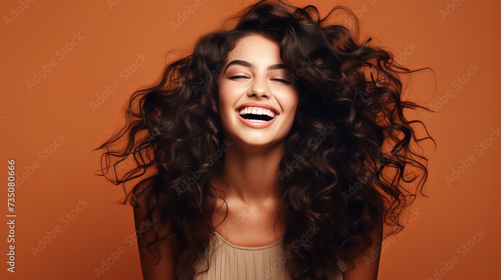 Beautiful laughing brunette model girl with long curly hair . Smiling ...