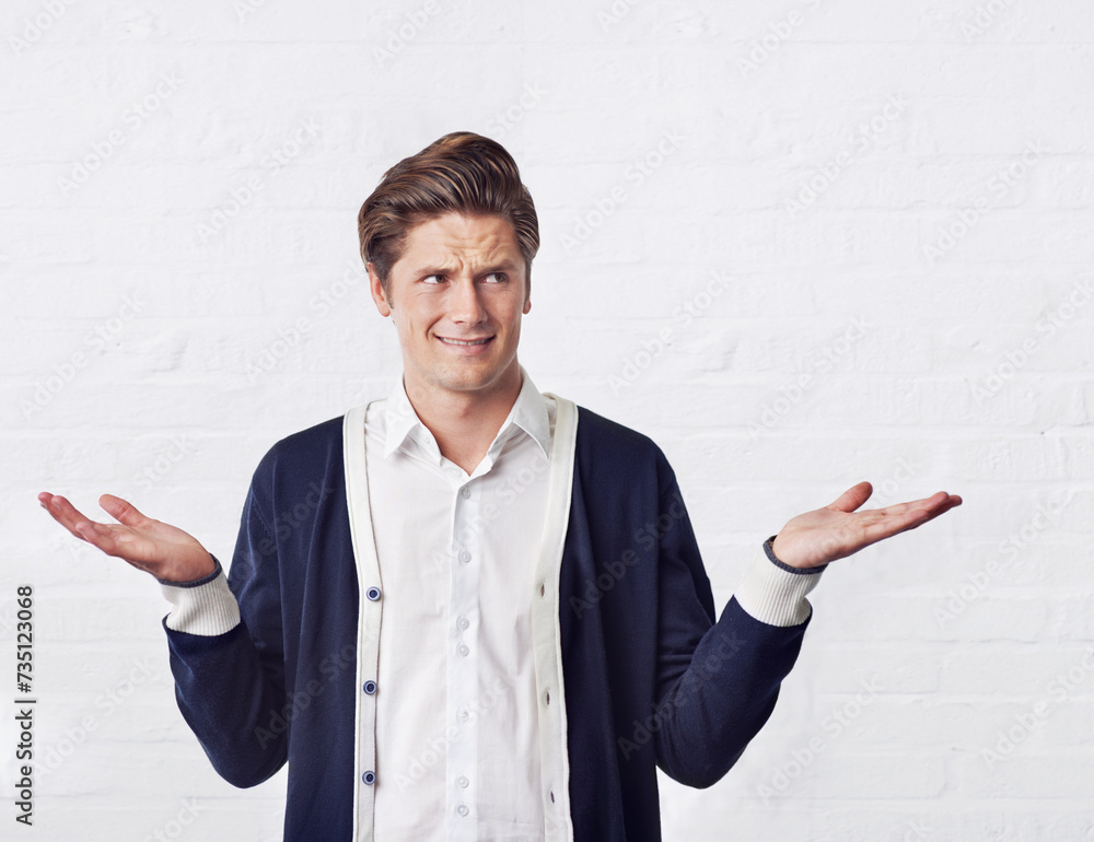 Confused, thinking and man with doubt on a white background for choice ...