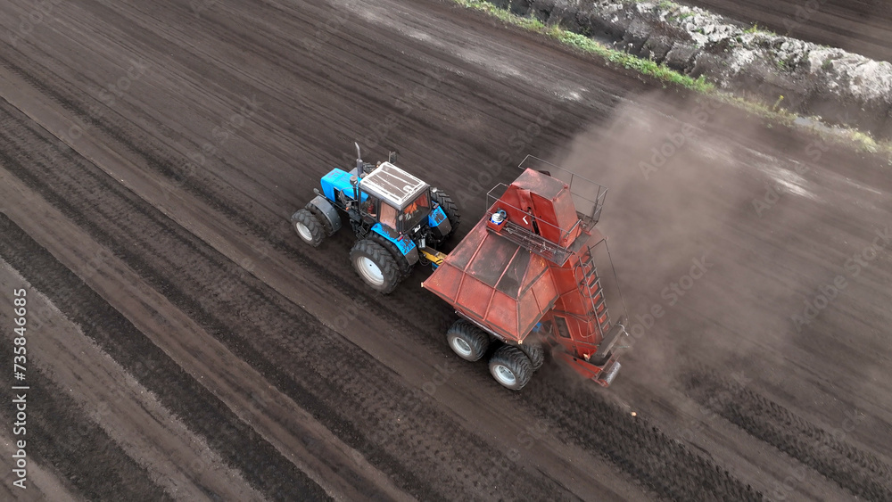 Peat Harvester Tractor on Collecting Extracting Peat. Mining and ...