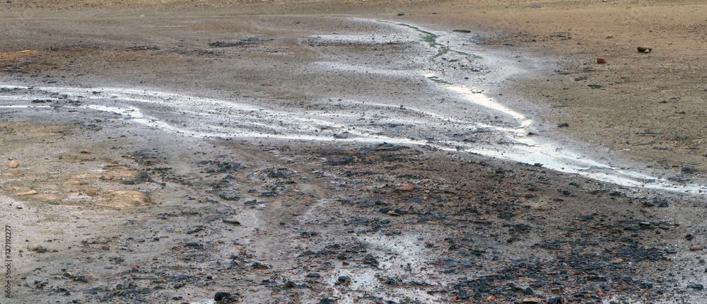 Spills of crude oil on the soil surface.Pollution of sewage. Ecological ...