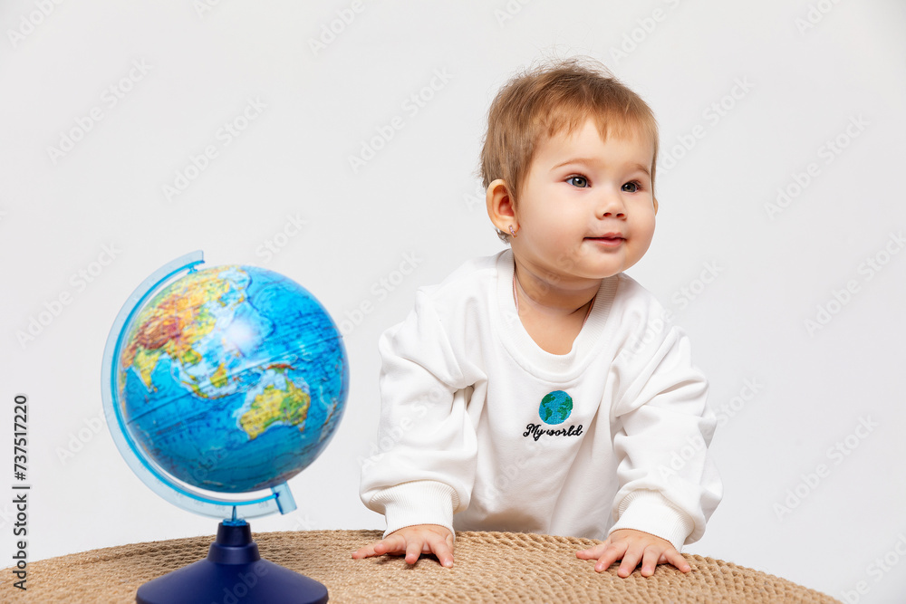 Earth day. Green concept. Portrait of a cute little newborn baby girl ...