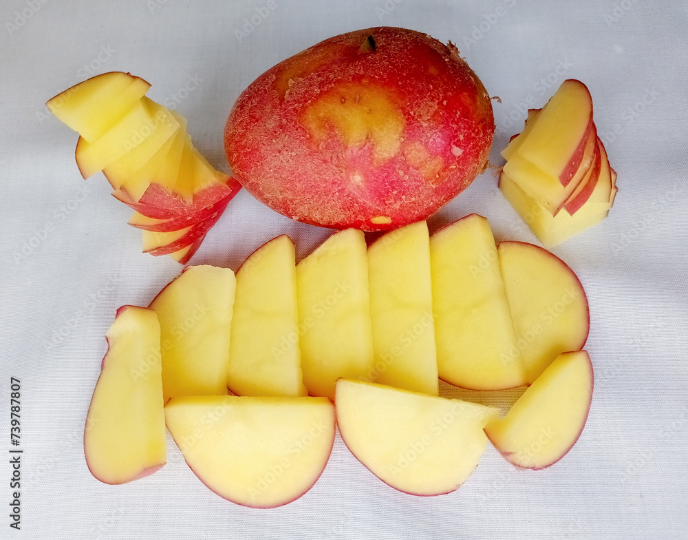 The potato, Solanum tuberosum, is a starchy tuberous crop that plays a ...