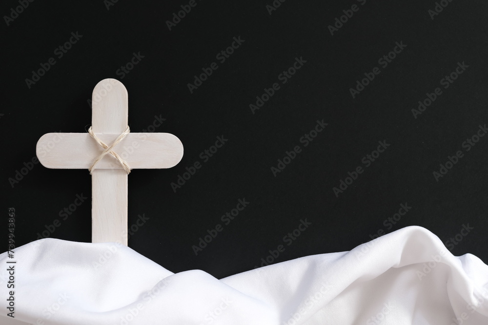 White wooden cross and fabric as symbol of heaven. Funeral and burial ...
