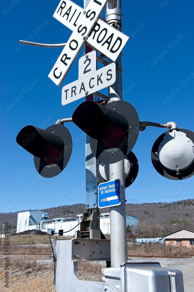 Gated railroad crossing with blue sky background Stock Photo | Adobe Stock