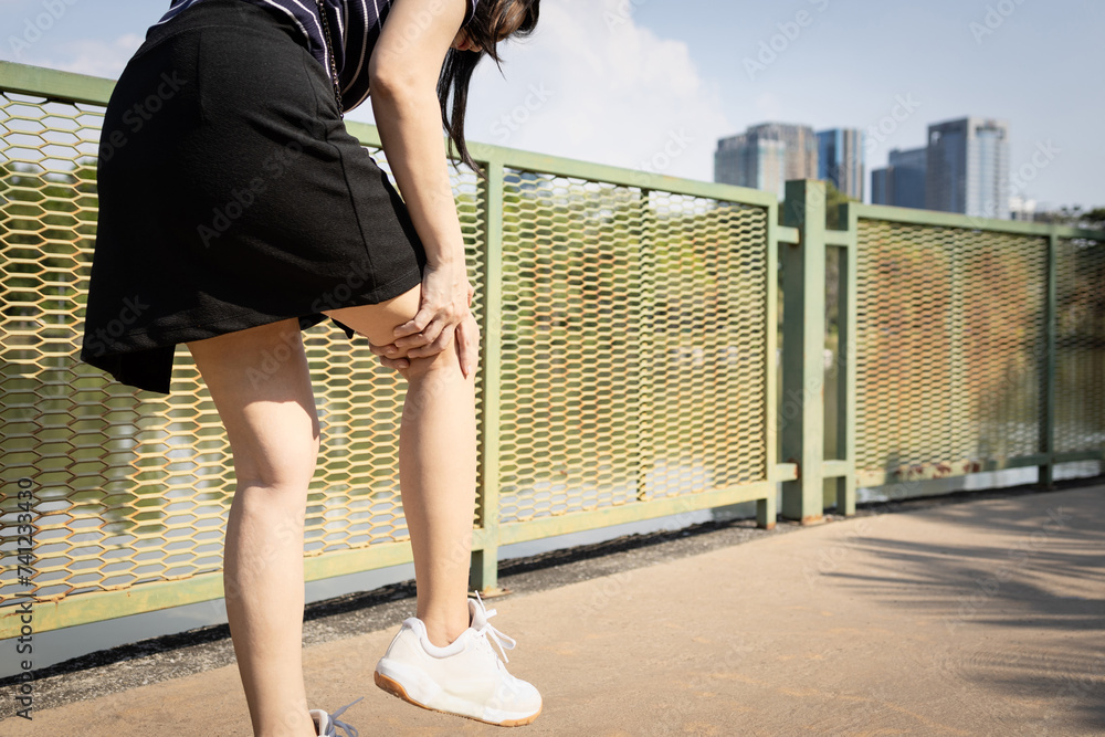 Middle aged woman suffering from knee ache,patella friction against the ...