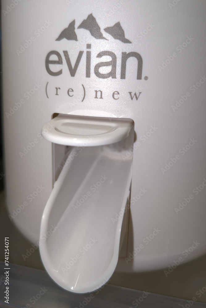 Evian Natural Mineral Water logo text and sign brand on water fountain ...
