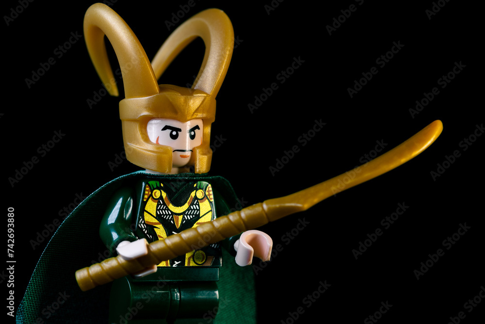LEGO Marvel's Loki in dark green cloak with the long sword in his hand ...