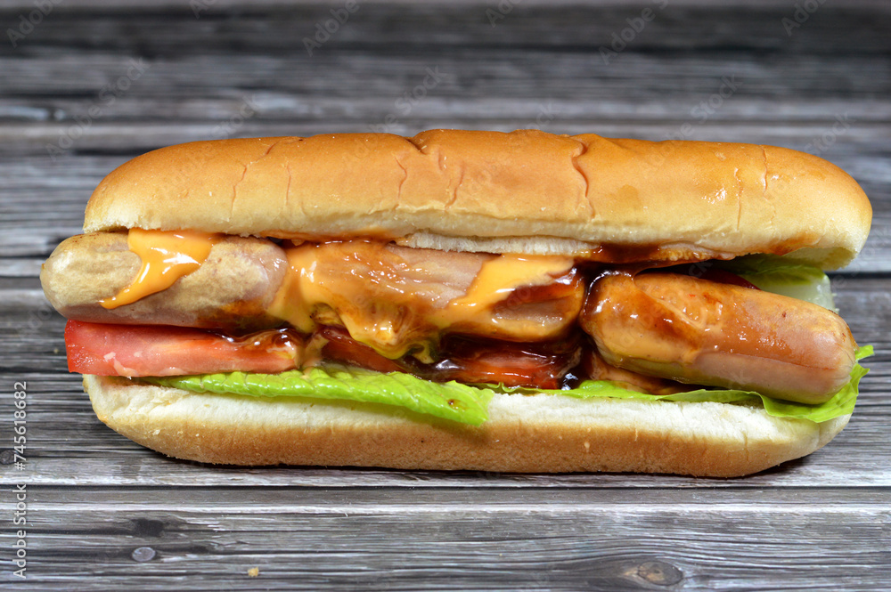 chicken hot dog with thousand island dressing sauce of ketchup ...