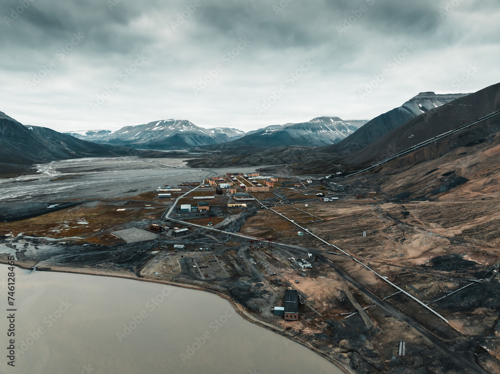 drone shot of Pyramiden, which is an abandoned Soviet coal mining ...