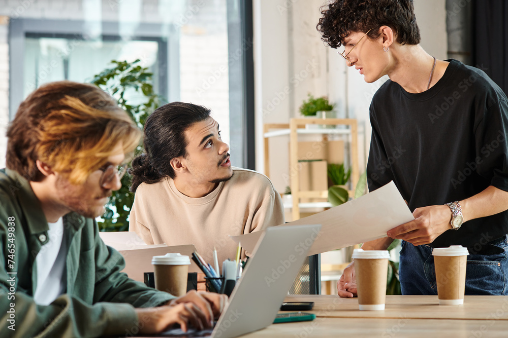Team of young entrepreneurs in their 20s engaged in project planning in ...