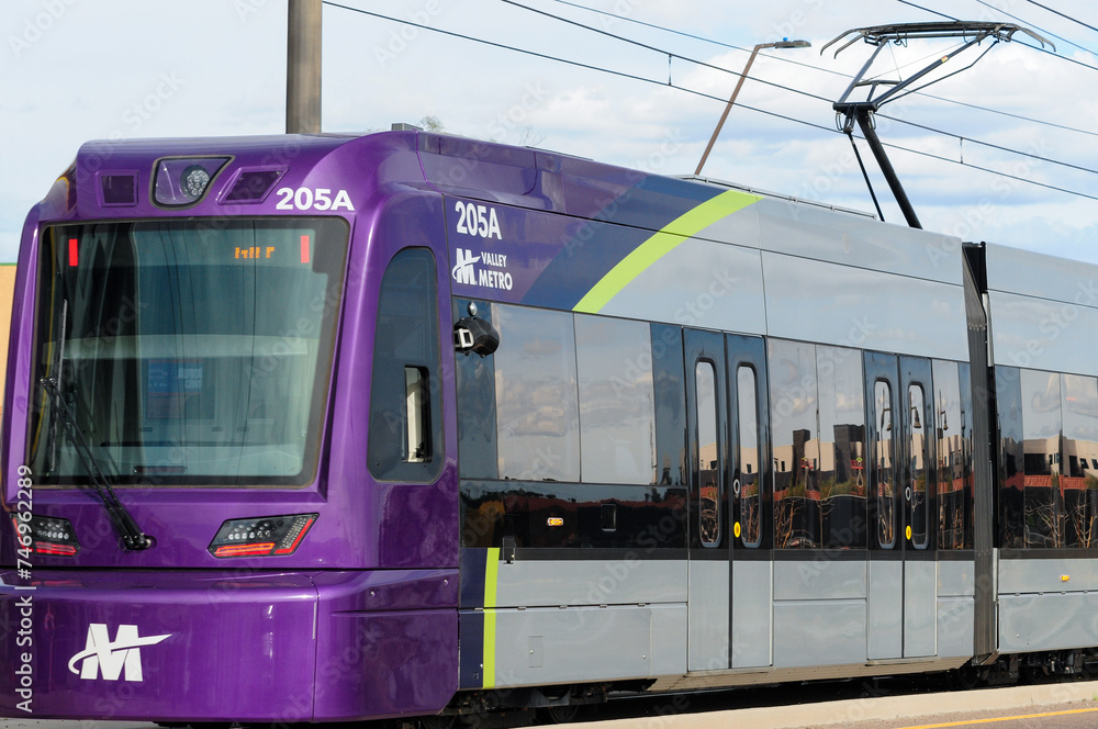 Valley Metro Rail light rail vehicle traveling along dedicated transit ...