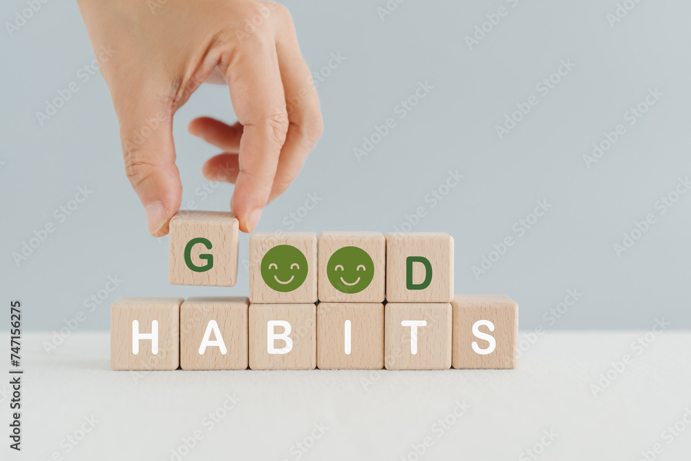 hand arranged good habits text with smiling face instead of O, for ...