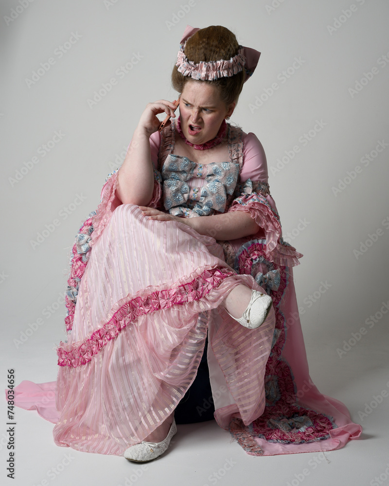 Full length portrait female model wearing opulent pink gown costume of ...