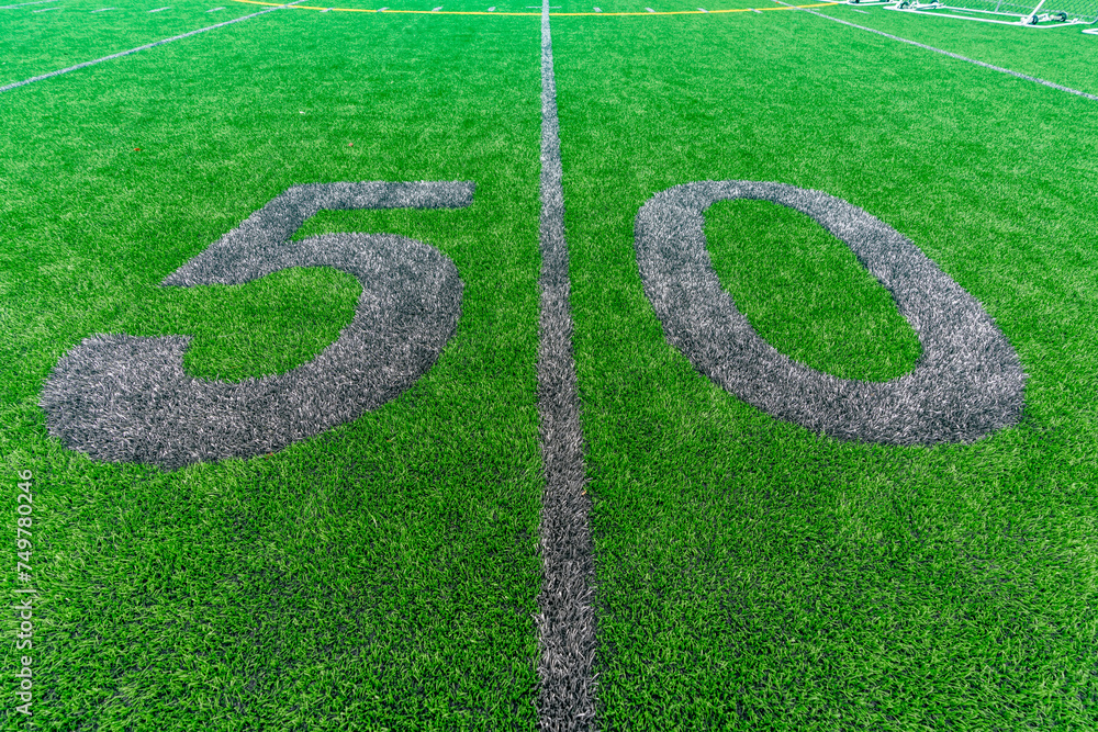 Synthetic turf football 50 yard line and block style numbers in gray ...