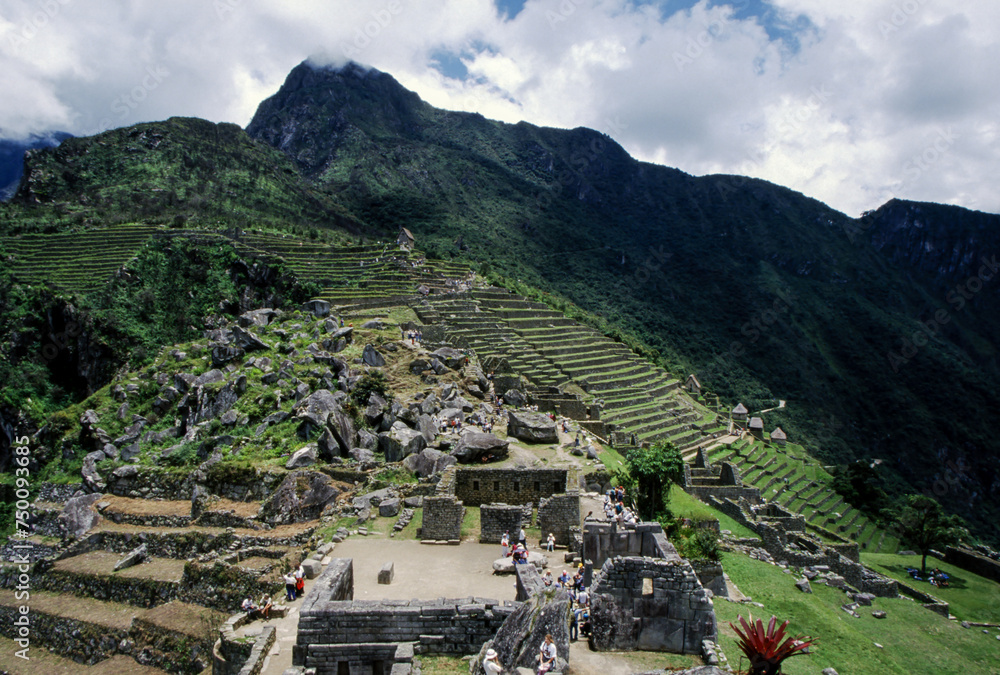 Over 7,000 feet above sea level in the Andes Mountains, Machu Picchu is ...