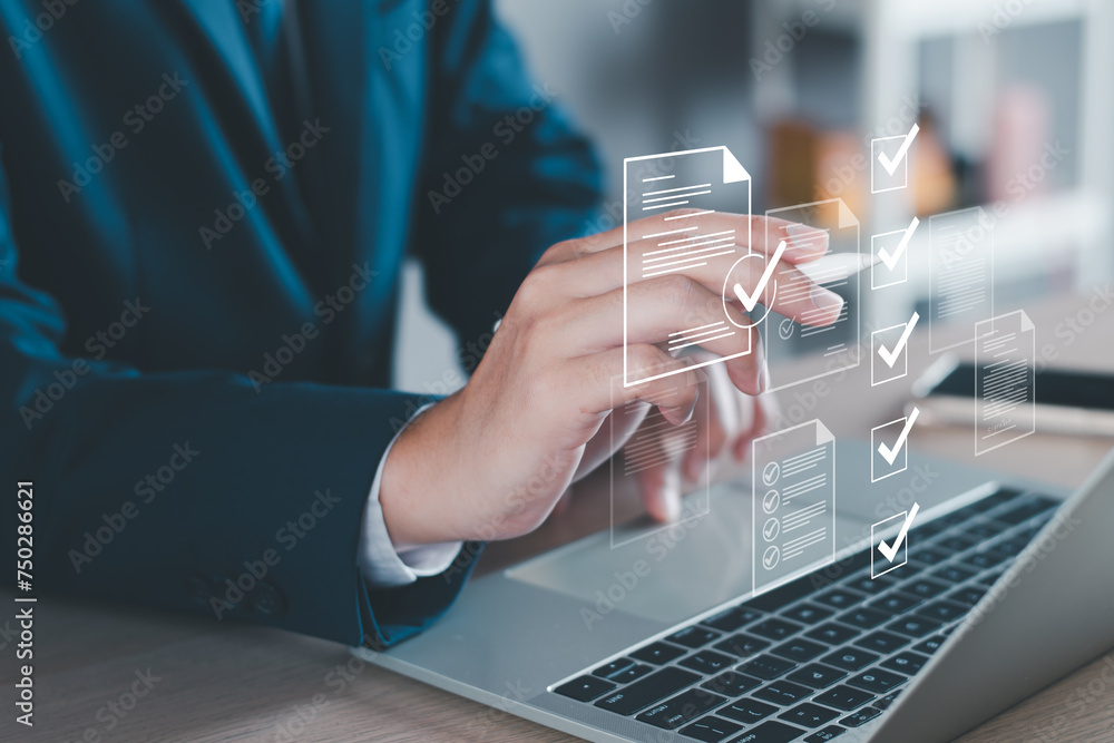 Stock-Foto „Check list concept. Businessman tick off questionnaire ...