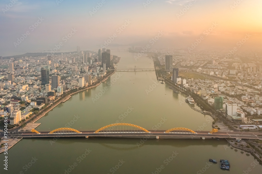 Dragon bridge at sunset which is considered as the icon of Da Nang city ...