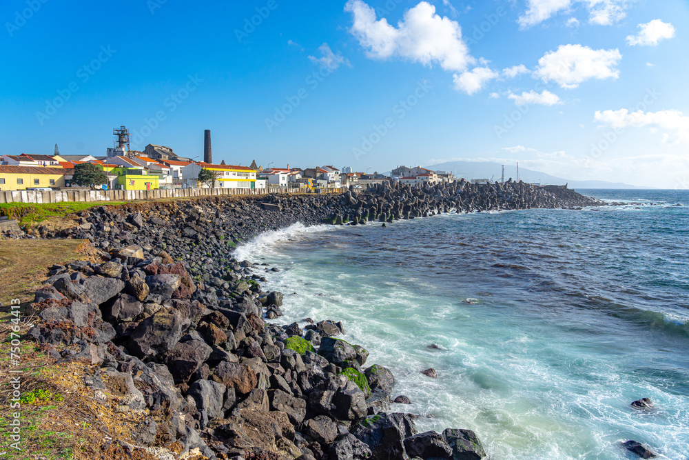 coast facing the Atlantic Ocean with breakwater barriers built by ...