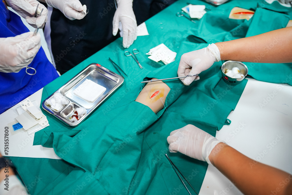 Nursing Students Practicing Surgical Suturing. A group of nursing ...