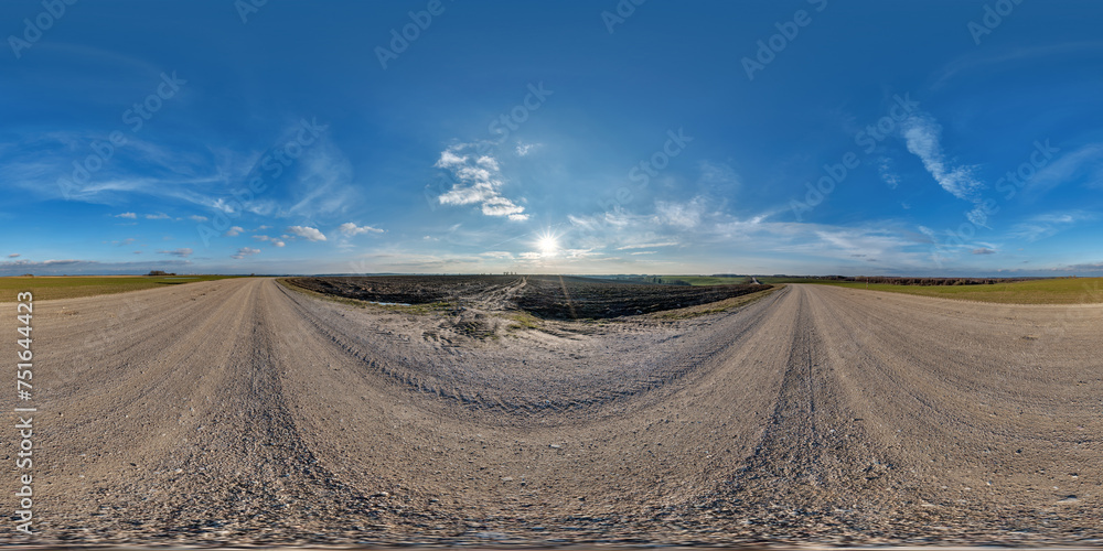 Stock-Foto „hdri 360 panorama on gravel road among fields in spring ...