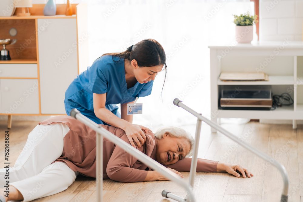 senior patient falling on the ground floor at home, Asian caregiver ...