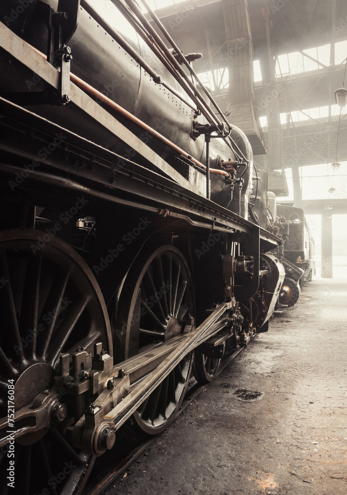 Stock-Foto „Steam era - old steam locomotive in train shed. Steam ...