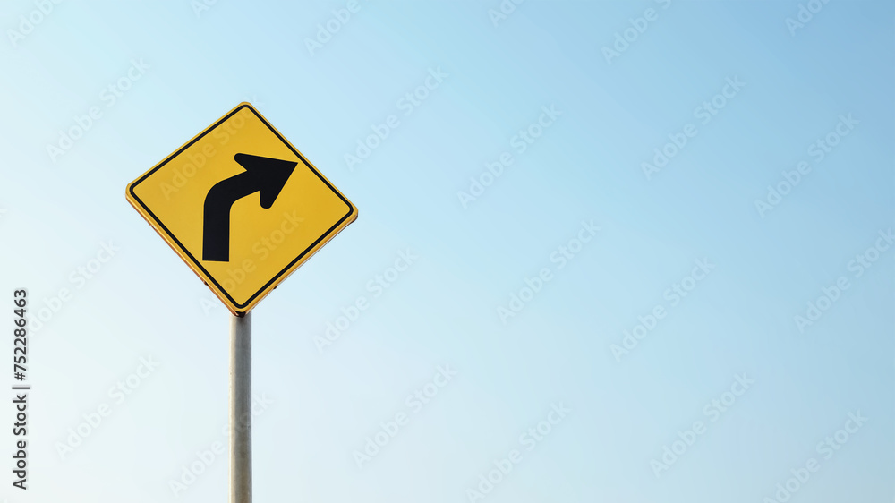 Traffic sign against bright sky background. Directional turn right ...