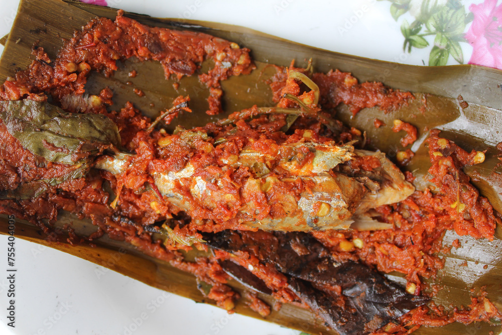 Pepes ikan pedas, or grilled fish with red chili and herbs, wrapped in ...