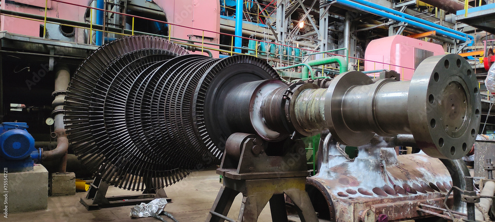 Disassembled steam turbine in the process of repairing and electric ...