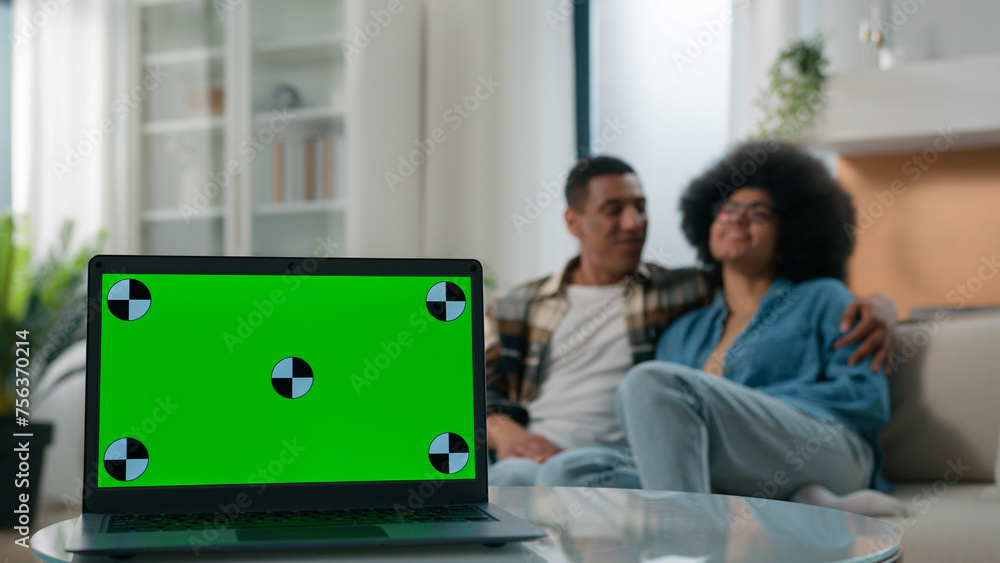 African American couple man woman hug relax at home couch girlfriend ...