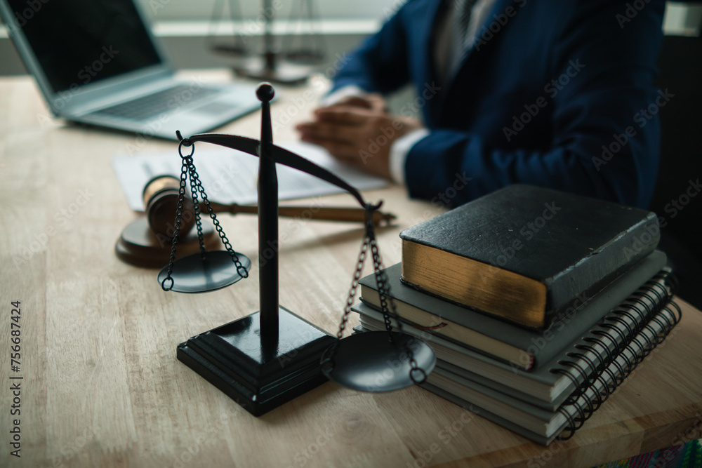 Brass scales are placed on lawyers desks in legal advice offices as a ...