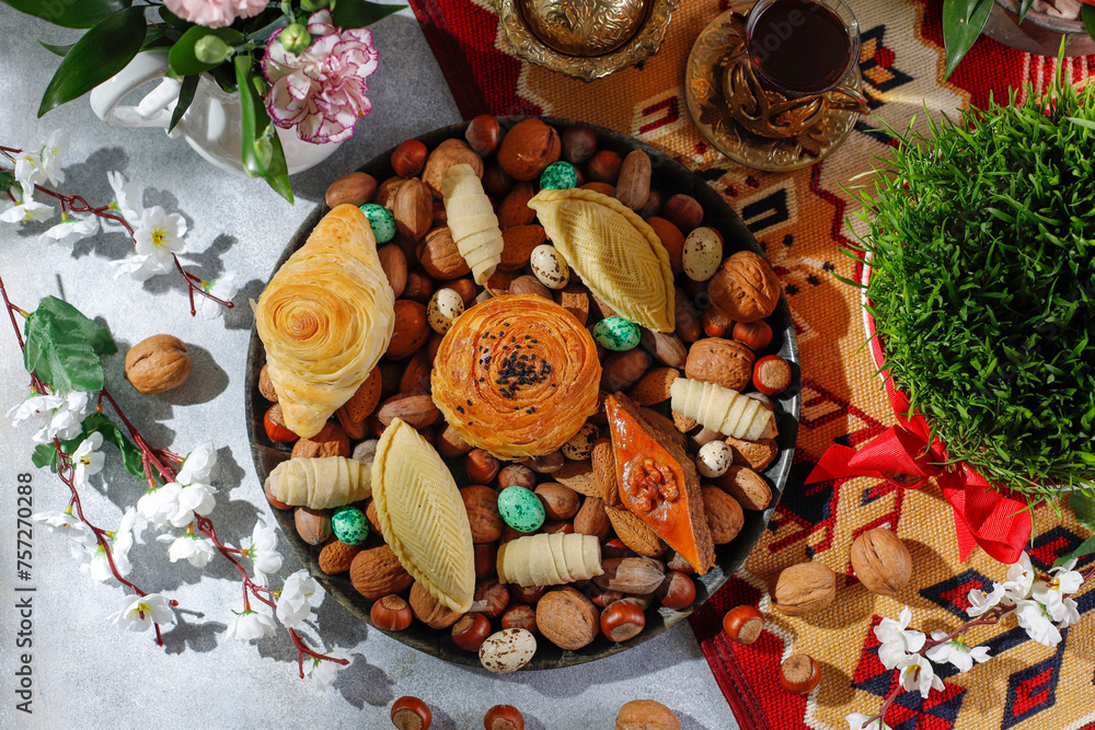 Traditional Azerbaijan holiday Novruz background with green semeni ...