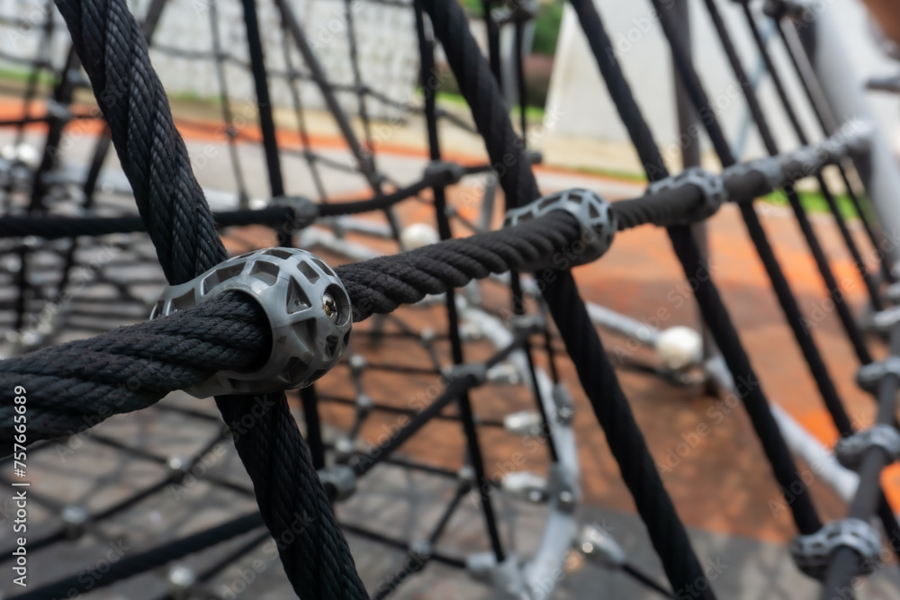 Photo Stock Climbing ropes in children's playgrounds, climbing nets ...