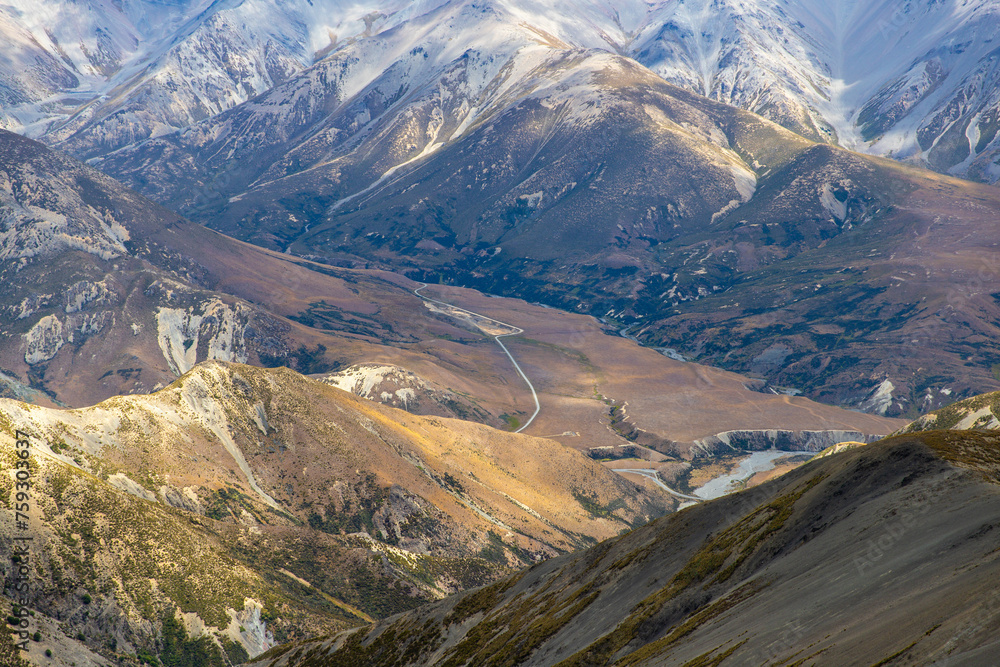 Rugged, rocky landscape of mountain ranges in Torlesse Tussocklands ...